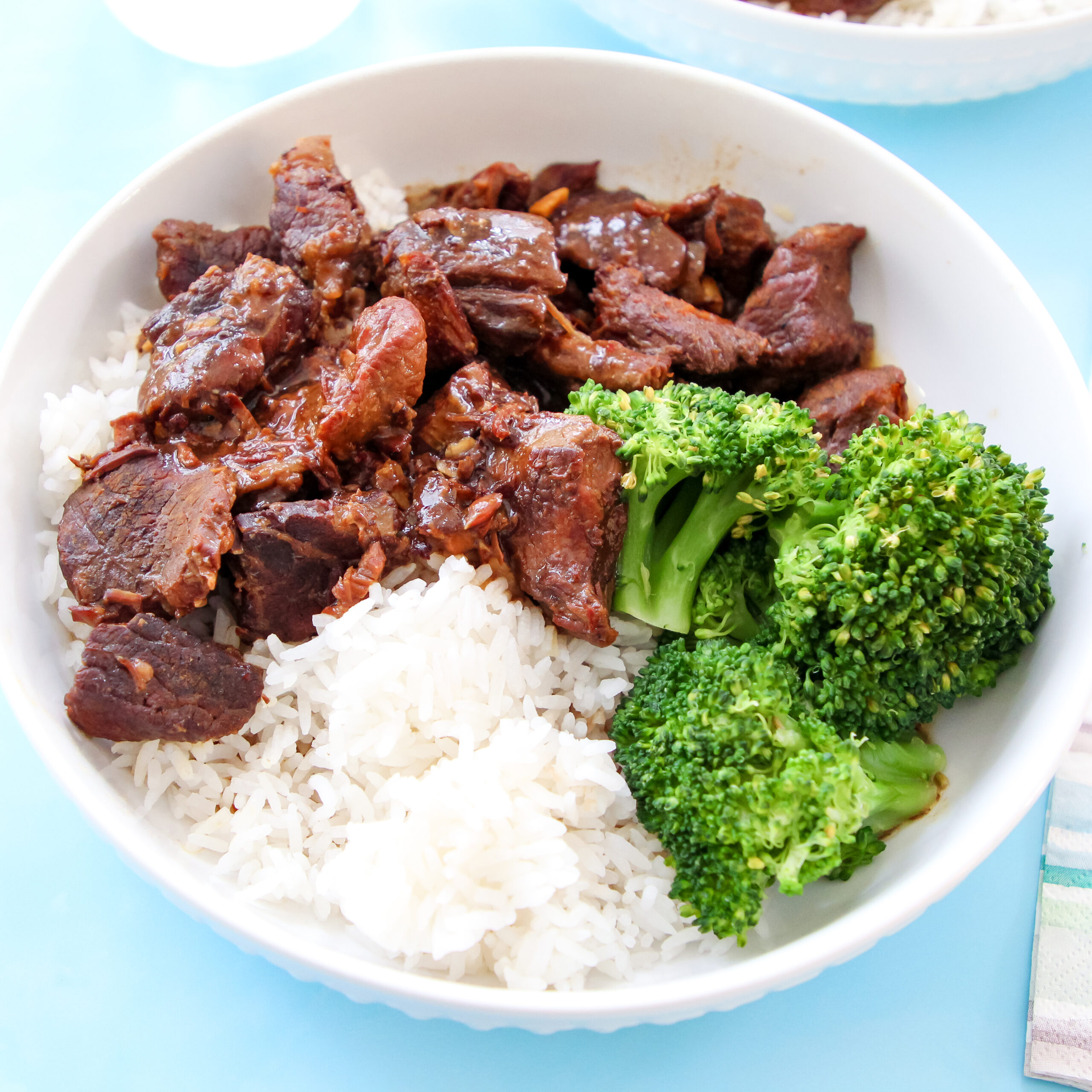 Slow-Cooked Sticky Orange Beef Bowls - Life & Sprinkles by Taryn Camp